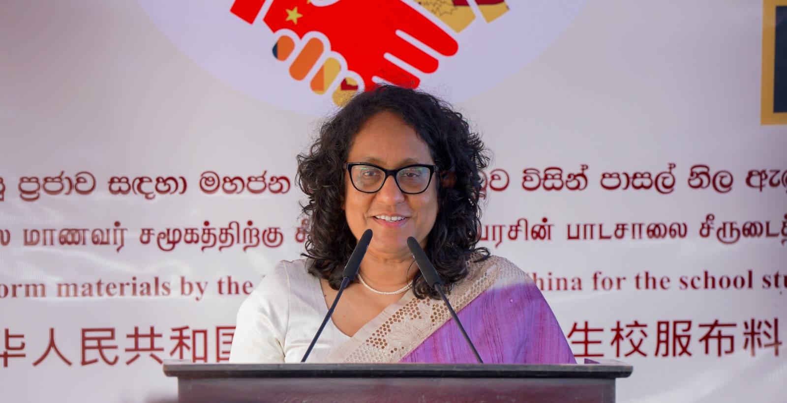 China hands over school uniform material for 2026 (Pics) – Sri Lanka ...