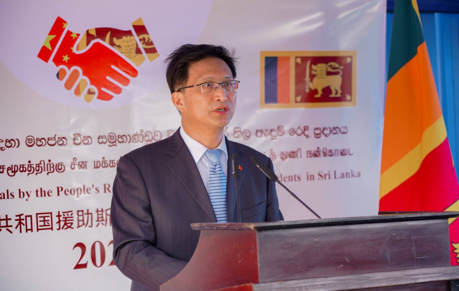 China hands over school uniform material for 2026 (Pics) – Sri Lanka ...
